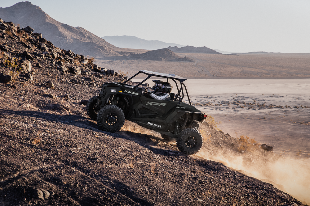 WebMedium_PNG-2022-rzr-xp-1000-premium-black-out-image-riding_SIX6342 ...